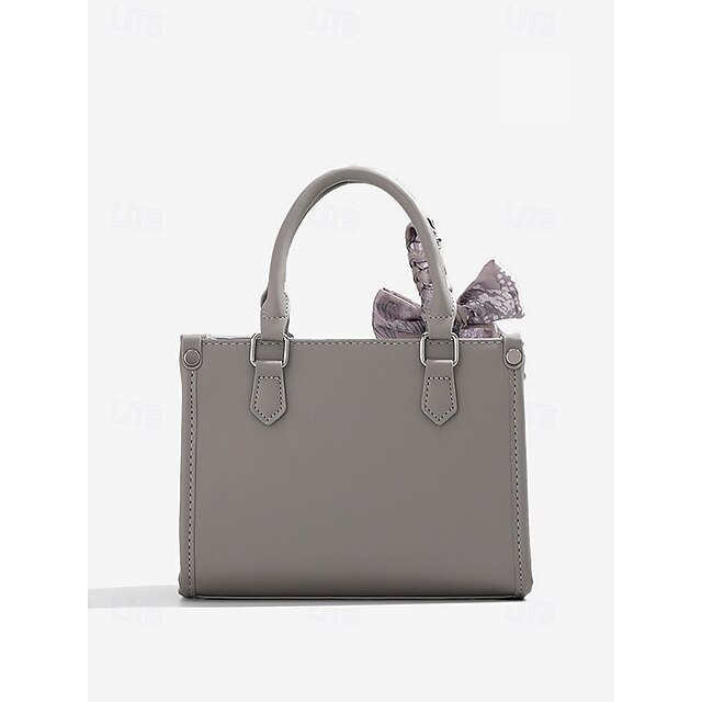 Women's Elegant Silver Floral Embossed Handbag with Oversized Bow ...
