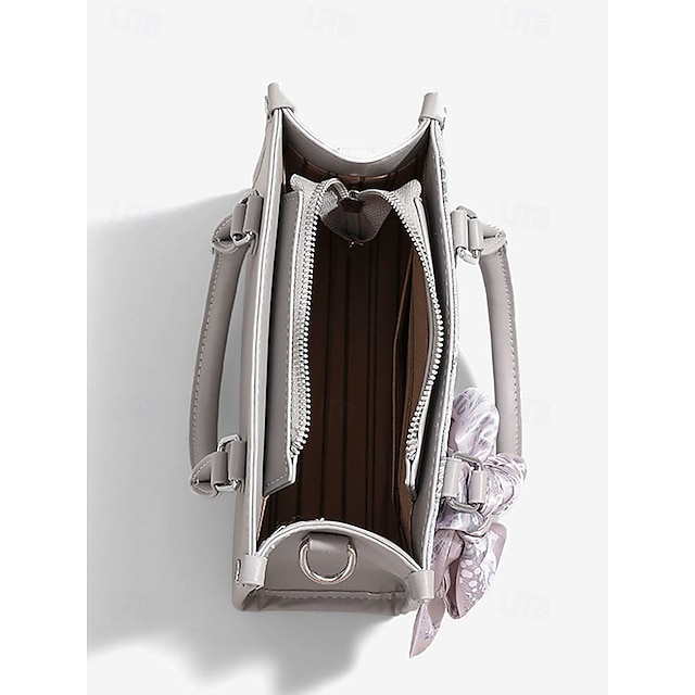 Women's Elegant Silver Floral Embossed Handbag with Oversized Bow ...