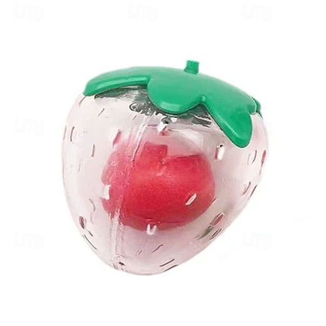 Jouet en caoutchouc mignon en forme de fraise qui couine lorsqu'il est ...