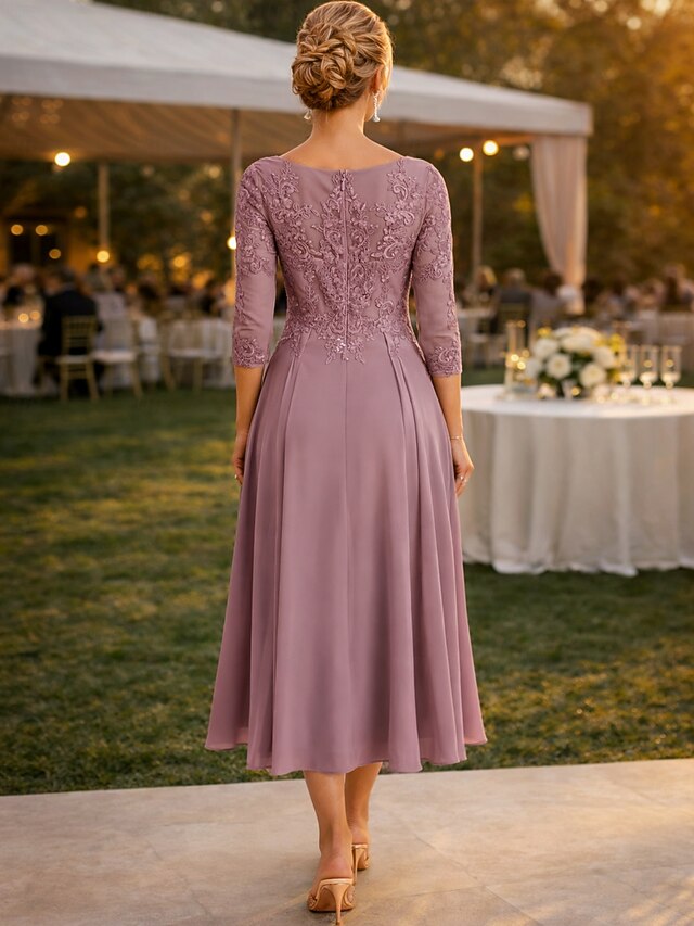 Spannende Kleid Mit Dreiviertelarm Bild